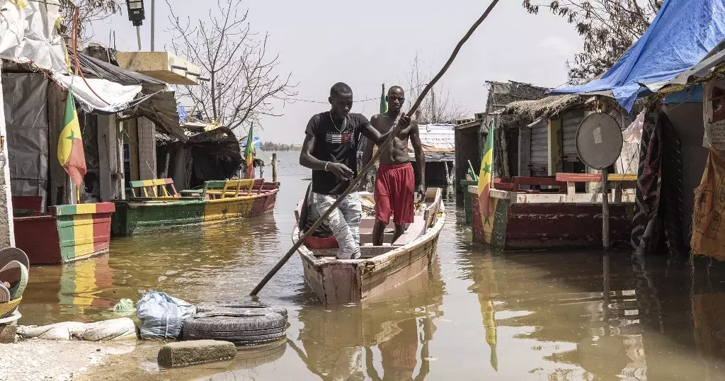 Floods Strike A Blow To Tourism Around Senegal’s Pink Lake And Salt ...